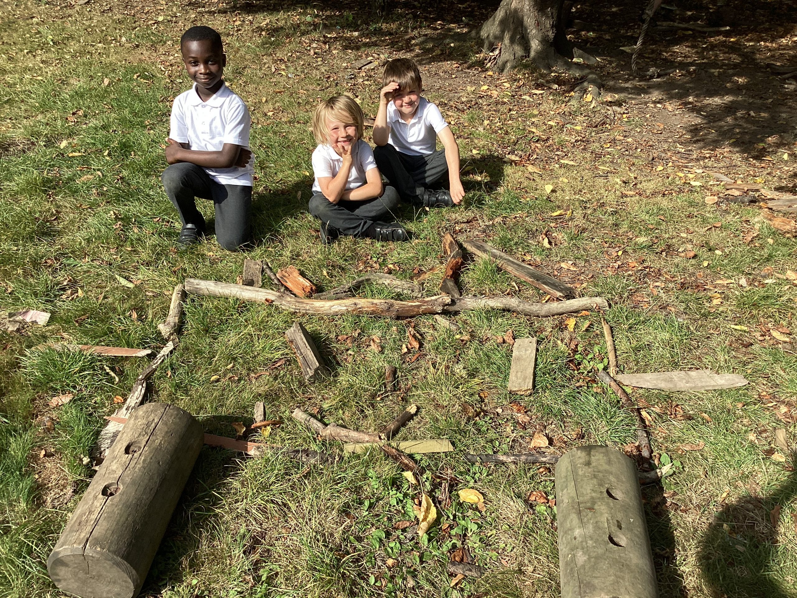 Making faces in the forest floor | All Souls' Catholic Primary School